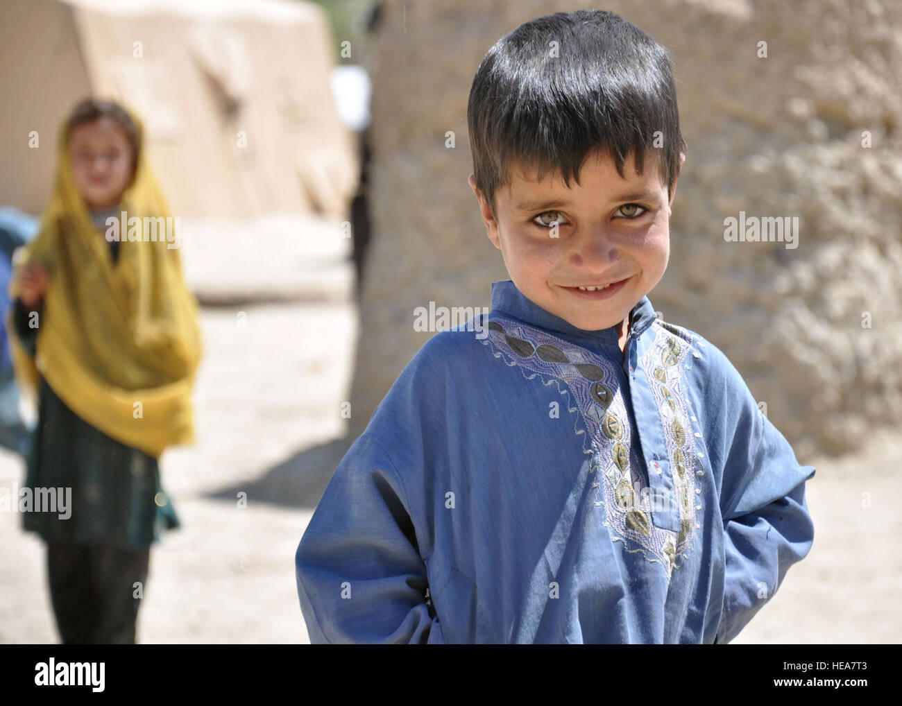 An Afghan boy at a refugee camp in Kabul smiles for a photo. Volunteers ...