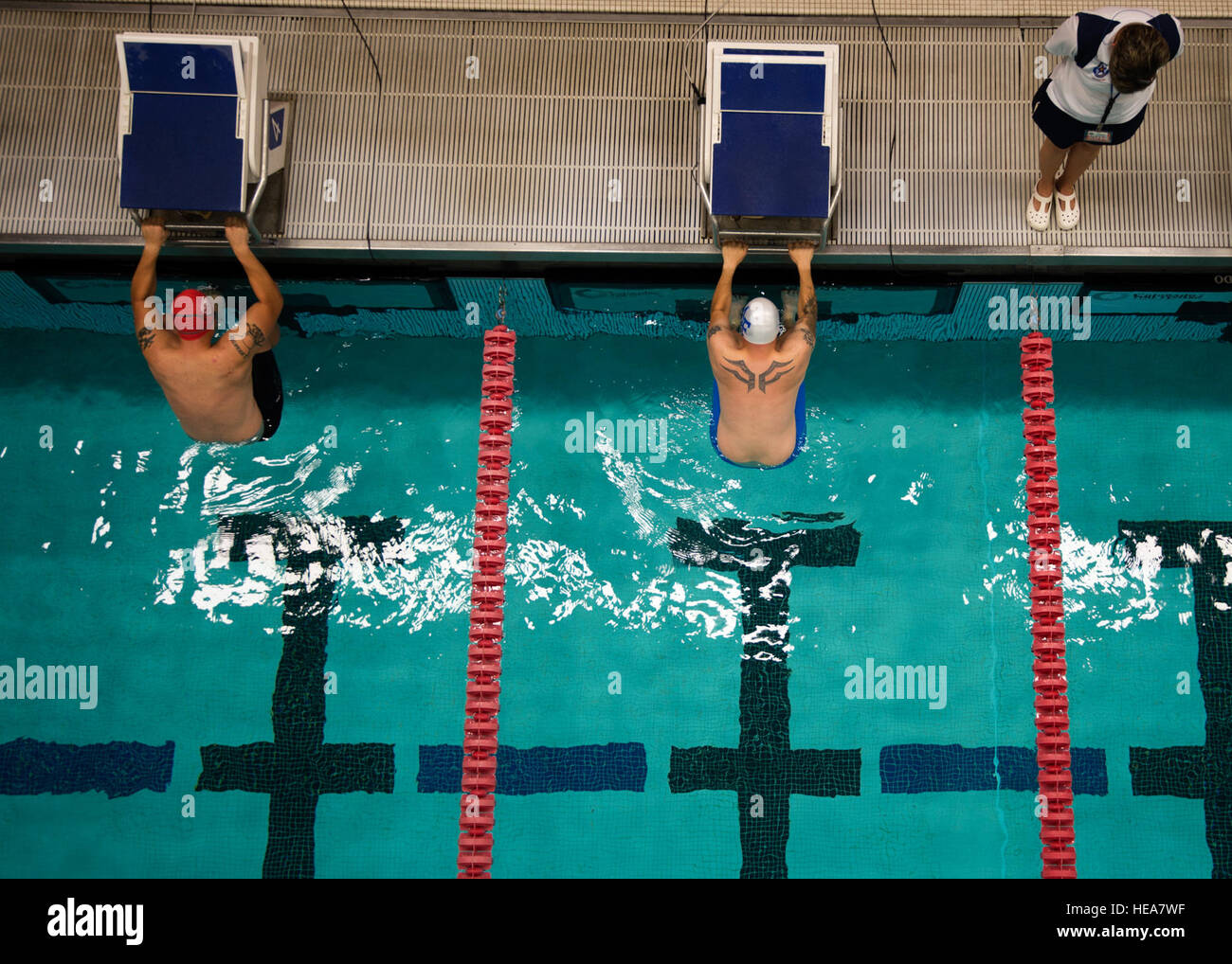 Air Force athlete Jason Hoover(right) readies himself for the start of ...