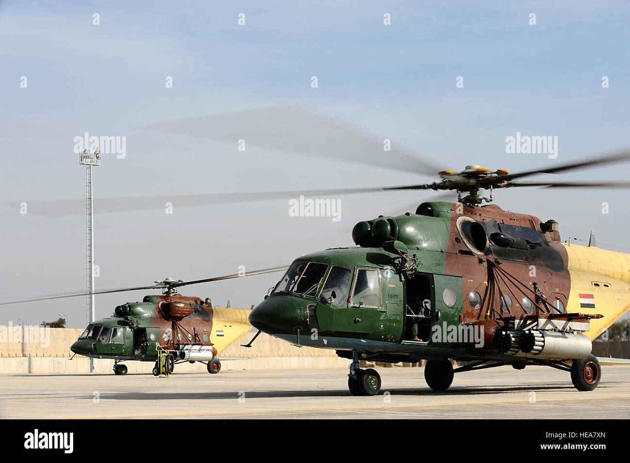 Two Iraqi Mi-17 Hip Helicopters conduct an aeromedical evacuation ...