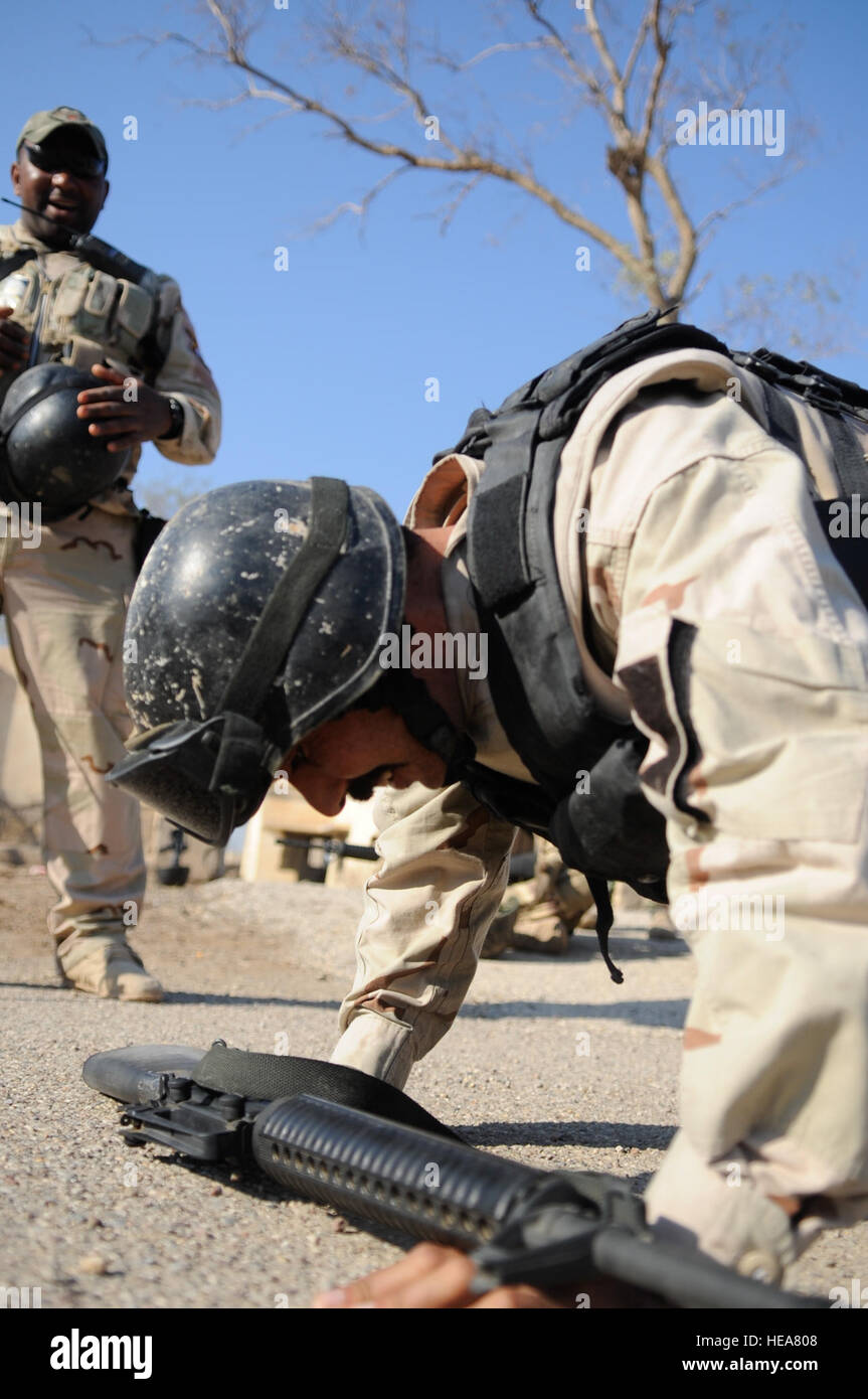 An Iraqi soldier begins the stress fire training with ten push-ups on ...