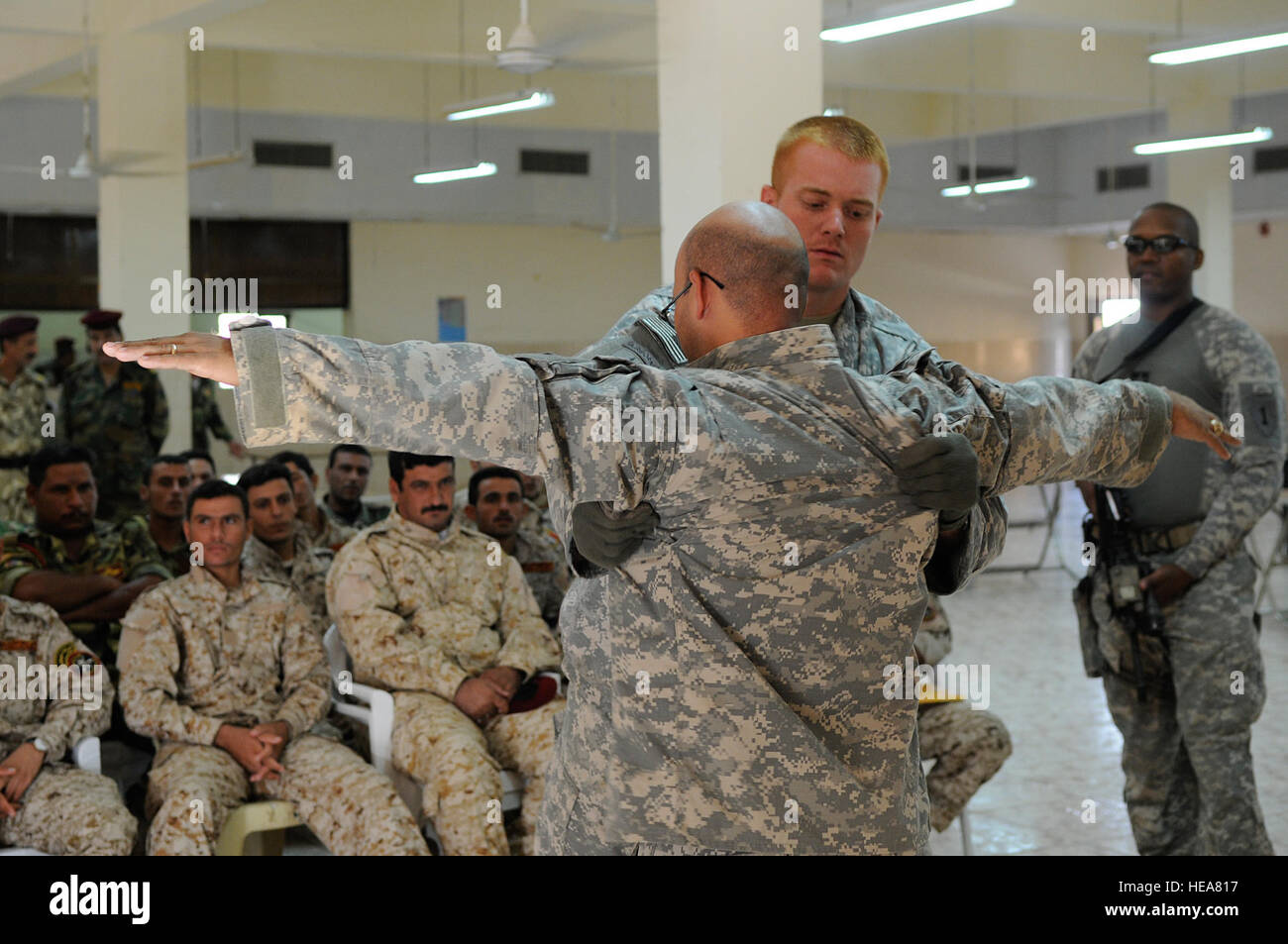 U.S. Army Staff Sgt. Chris Branam, from Odessa, Texas, demonstrates how ...