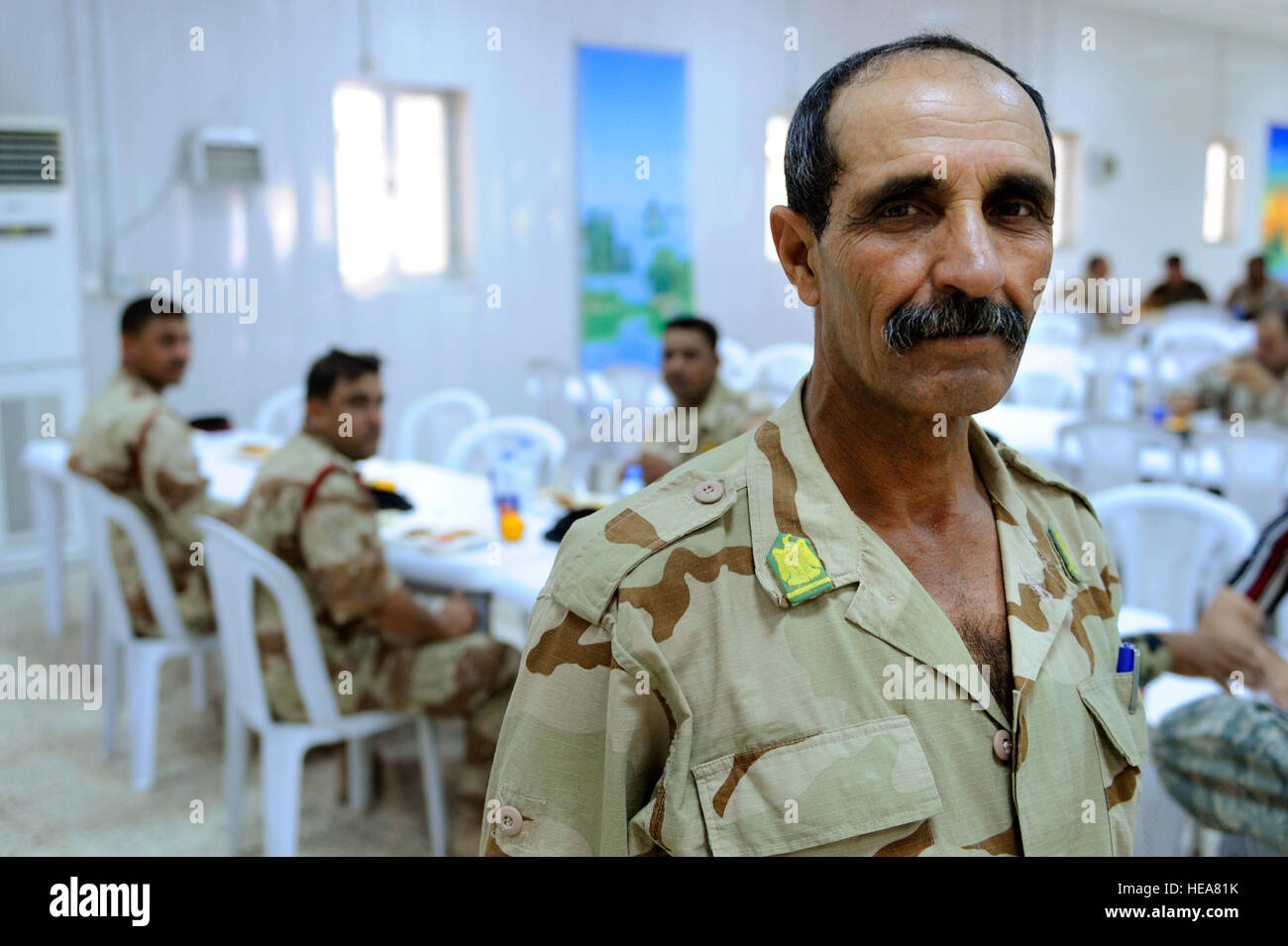 Iraqi soldiers eat lunch at their dining facility, at Camp Taji, near ...