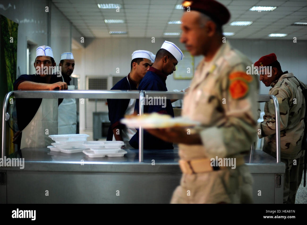 Iraqi soldiers eat lunch at their dining facility, at Camp Taji, near ...