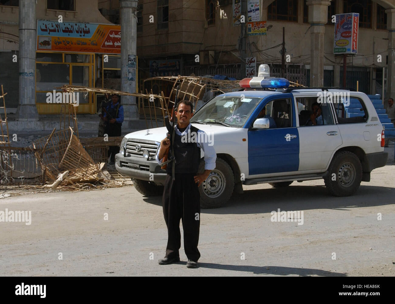 040828-F-8946M-004 (Aug. 28, 2004) Iraqi Police (IP) officers patrol ...