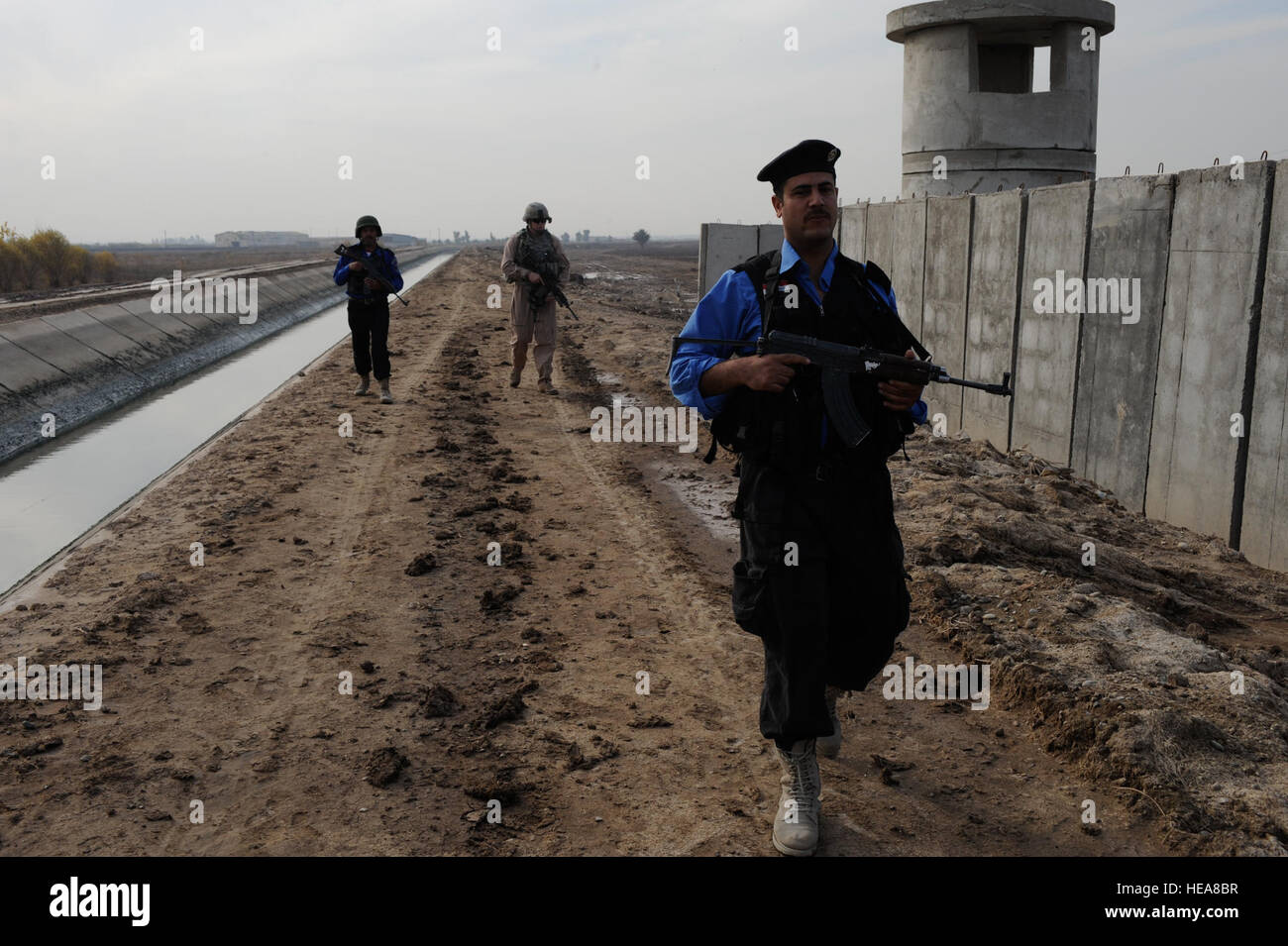 Iraqi Policemen and a member of Detachment 3, 732nd Expeditionary ...
