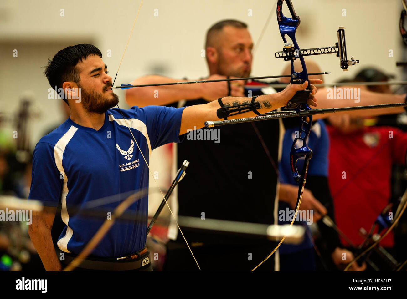 Air Force athlete Daniel Crain aims at his target in a qualification ...