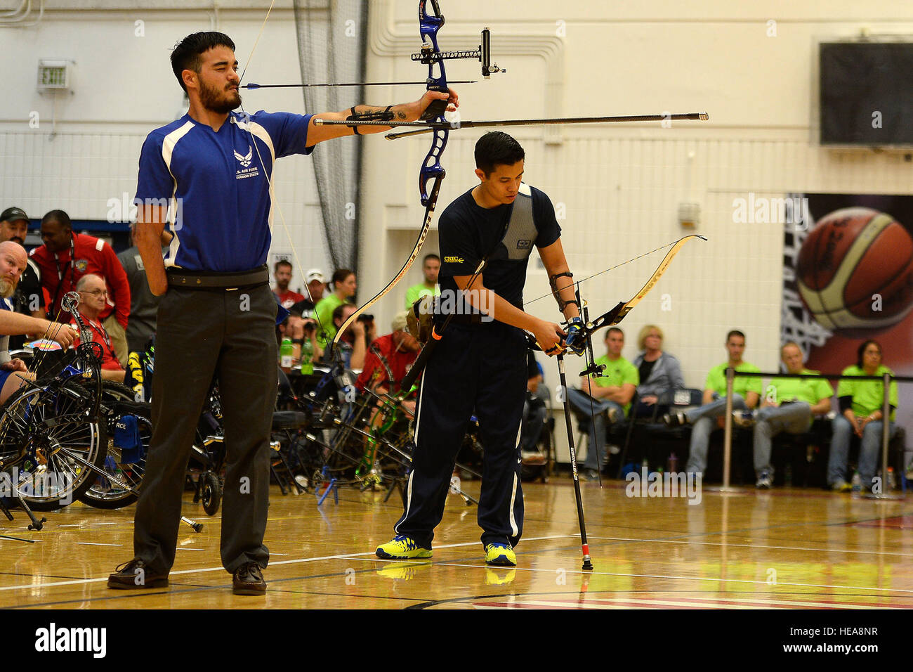 Air Force Athlete Daniel Crane (left) competes in archery during the ...