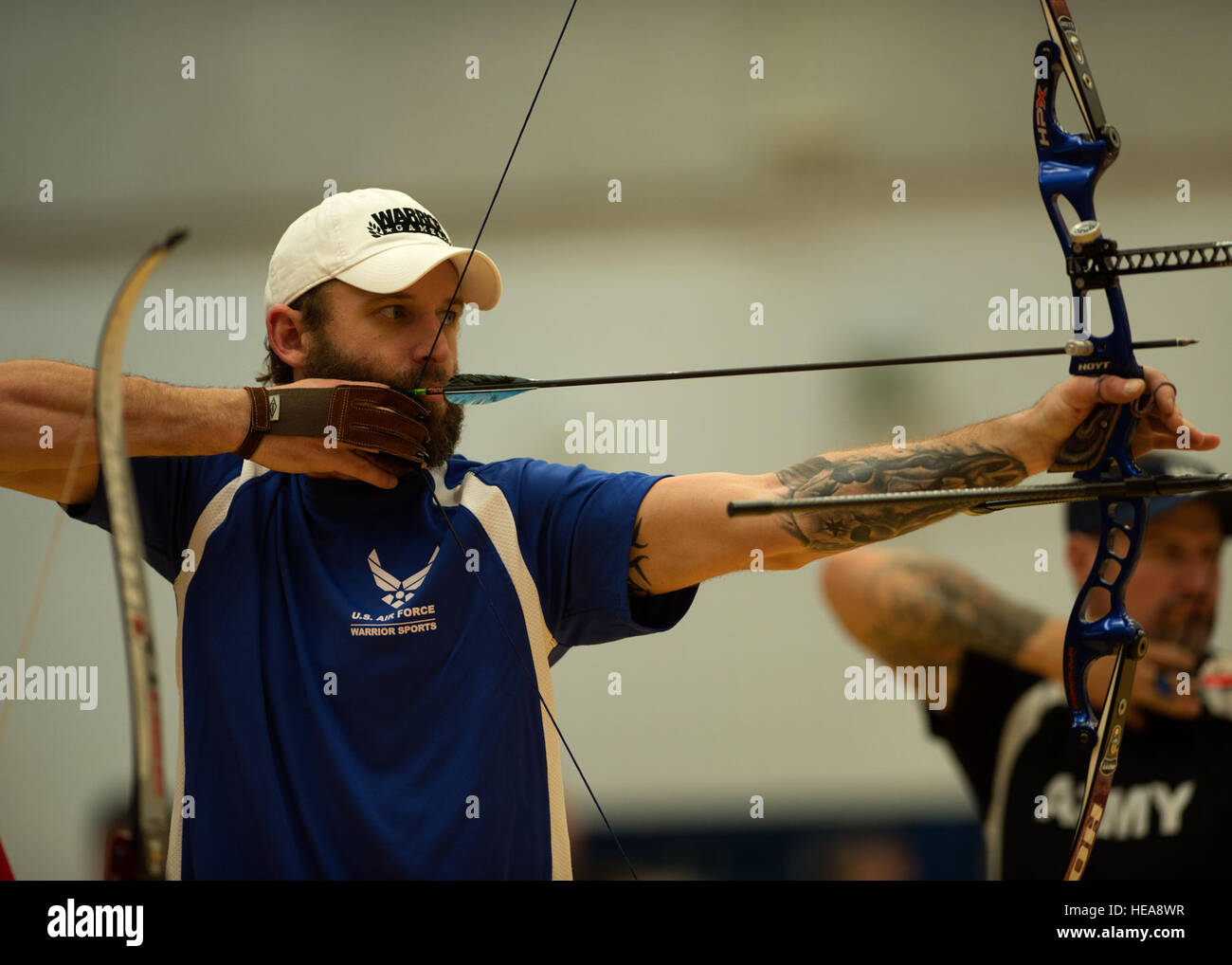 Air Force athlete Ryan Gallo takes aim during the archery portion of ...