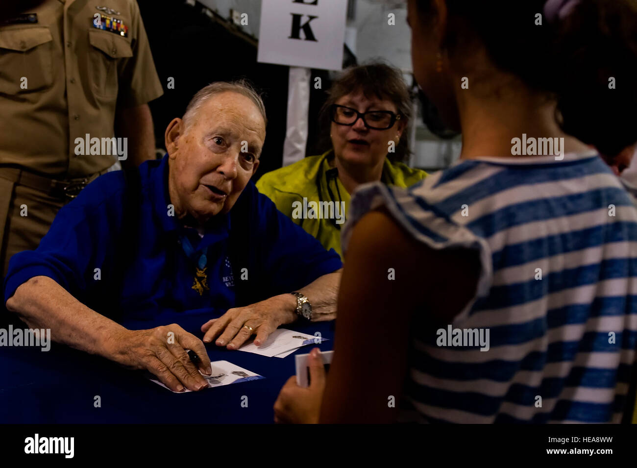Retired U.S. Army Col. and Medal of Honor recipient James Stone signs ...