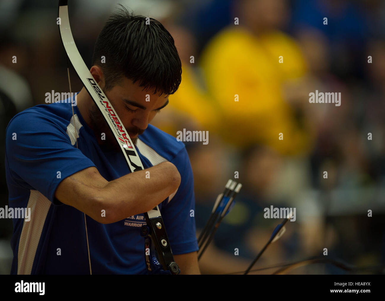 Air Force athlete Daniel Crane holds his bow to retrieve an arrow ...