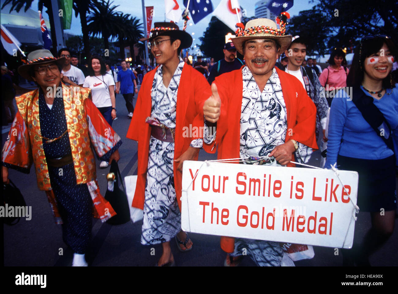A group of Japanese expatriates, wearing traditional dress, wander ...