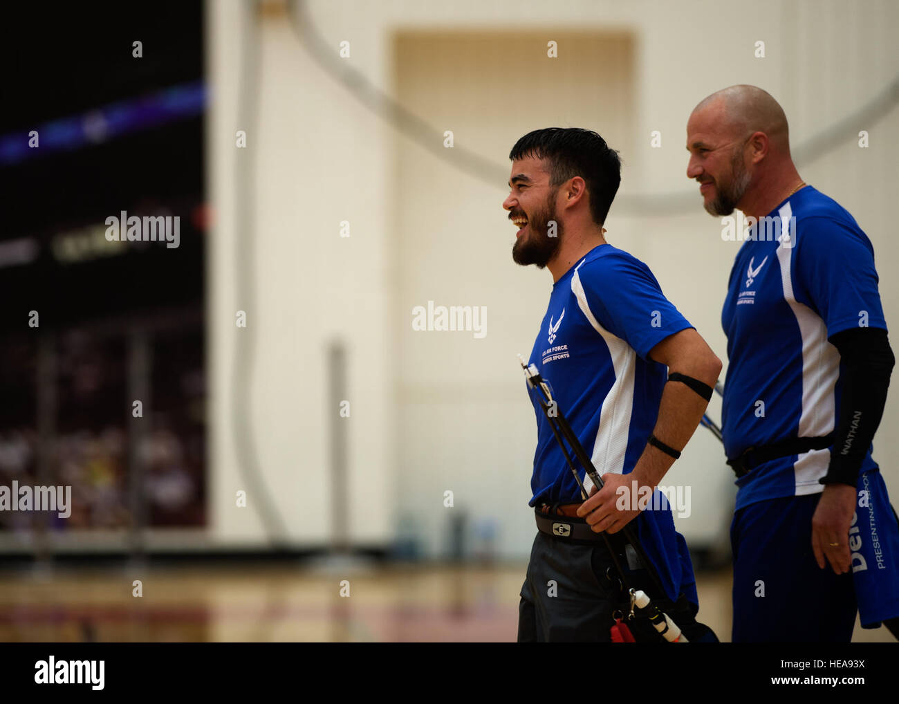 Air Force athlete Daniel Crane (left) and Corey Carter (right) walk ...