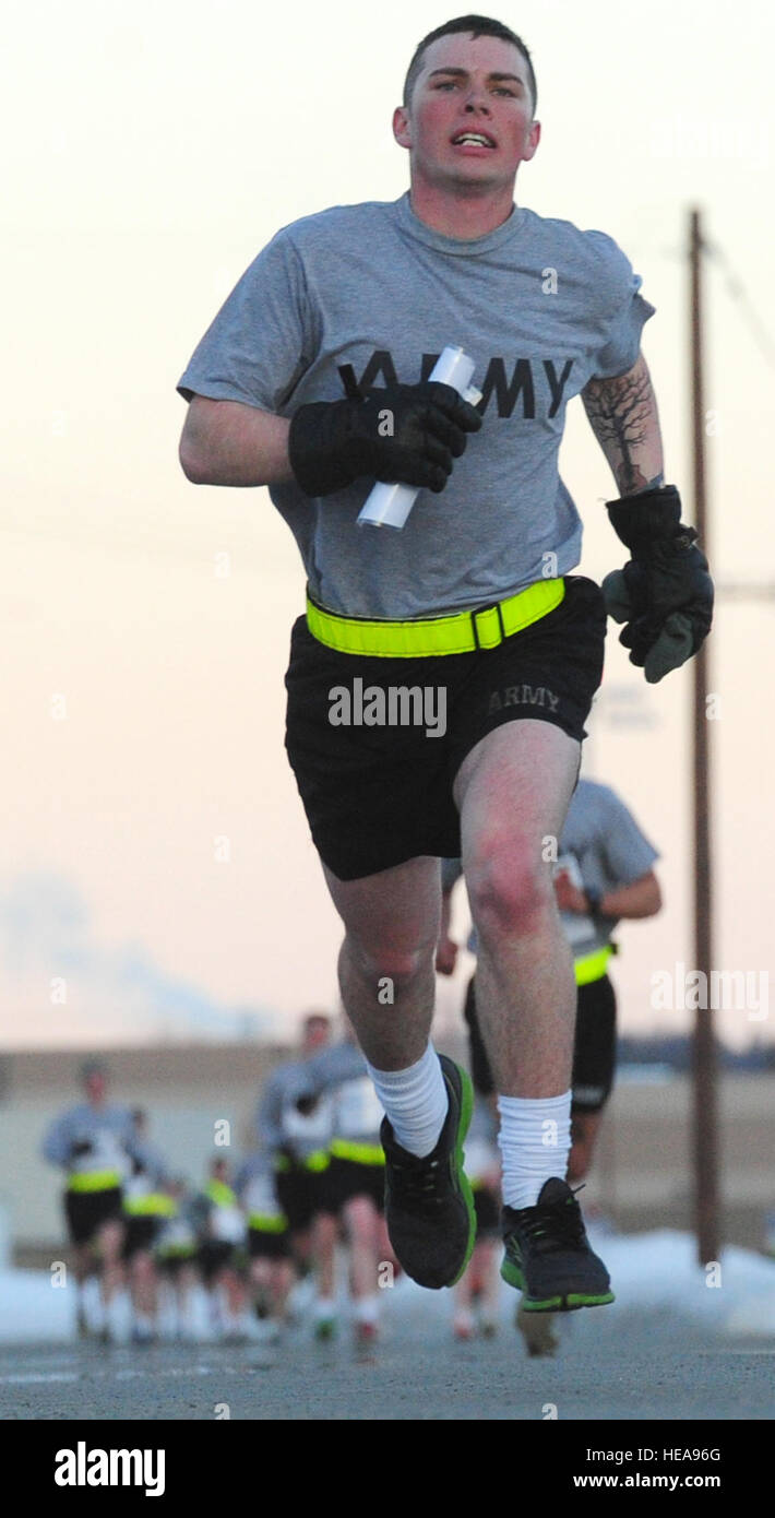 A parachute infantryman completes the two-mile run portion of the Army ...
