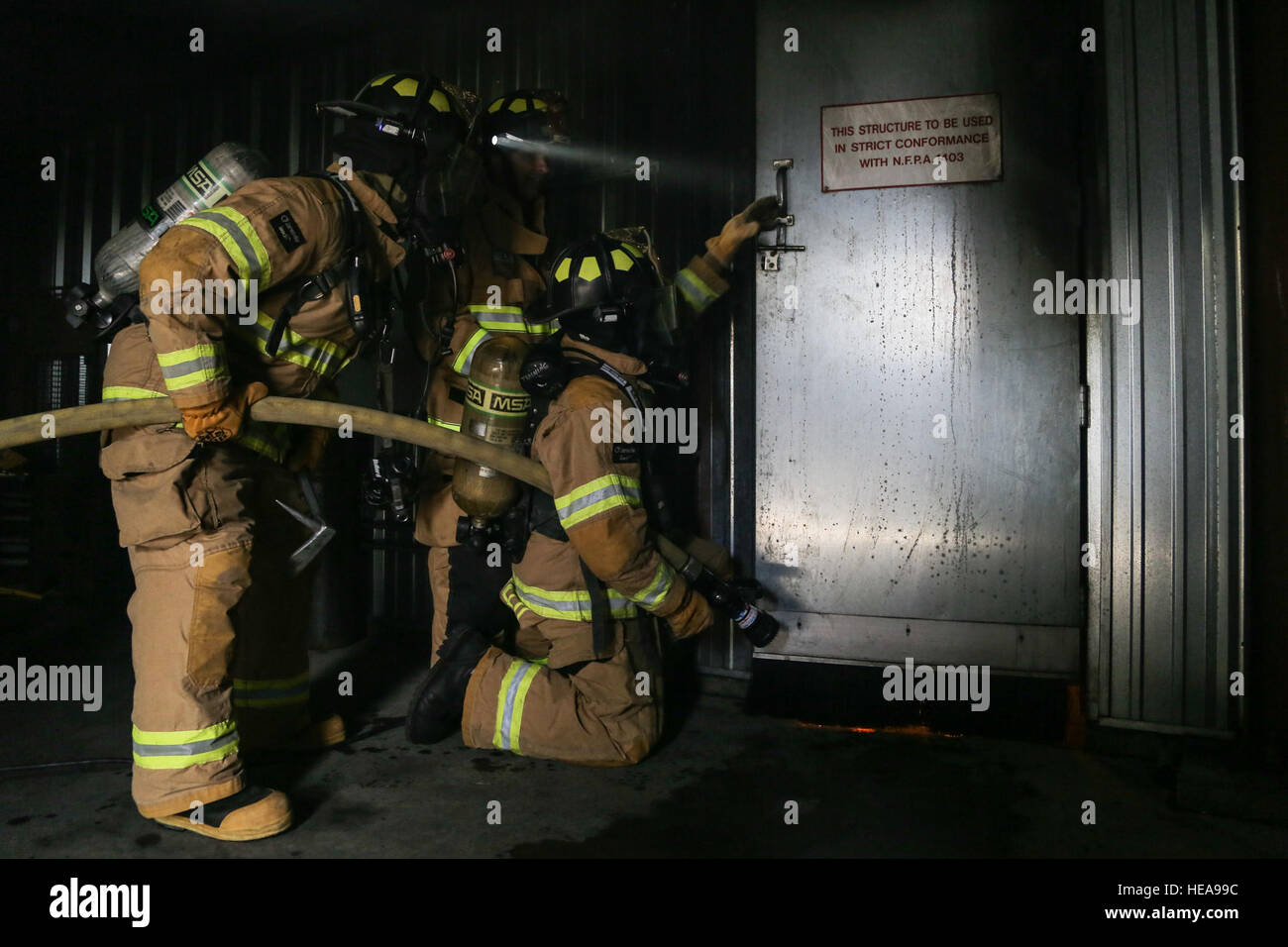 U.S. Air Force fire protection specialists assigned to the 673rd Civil ...