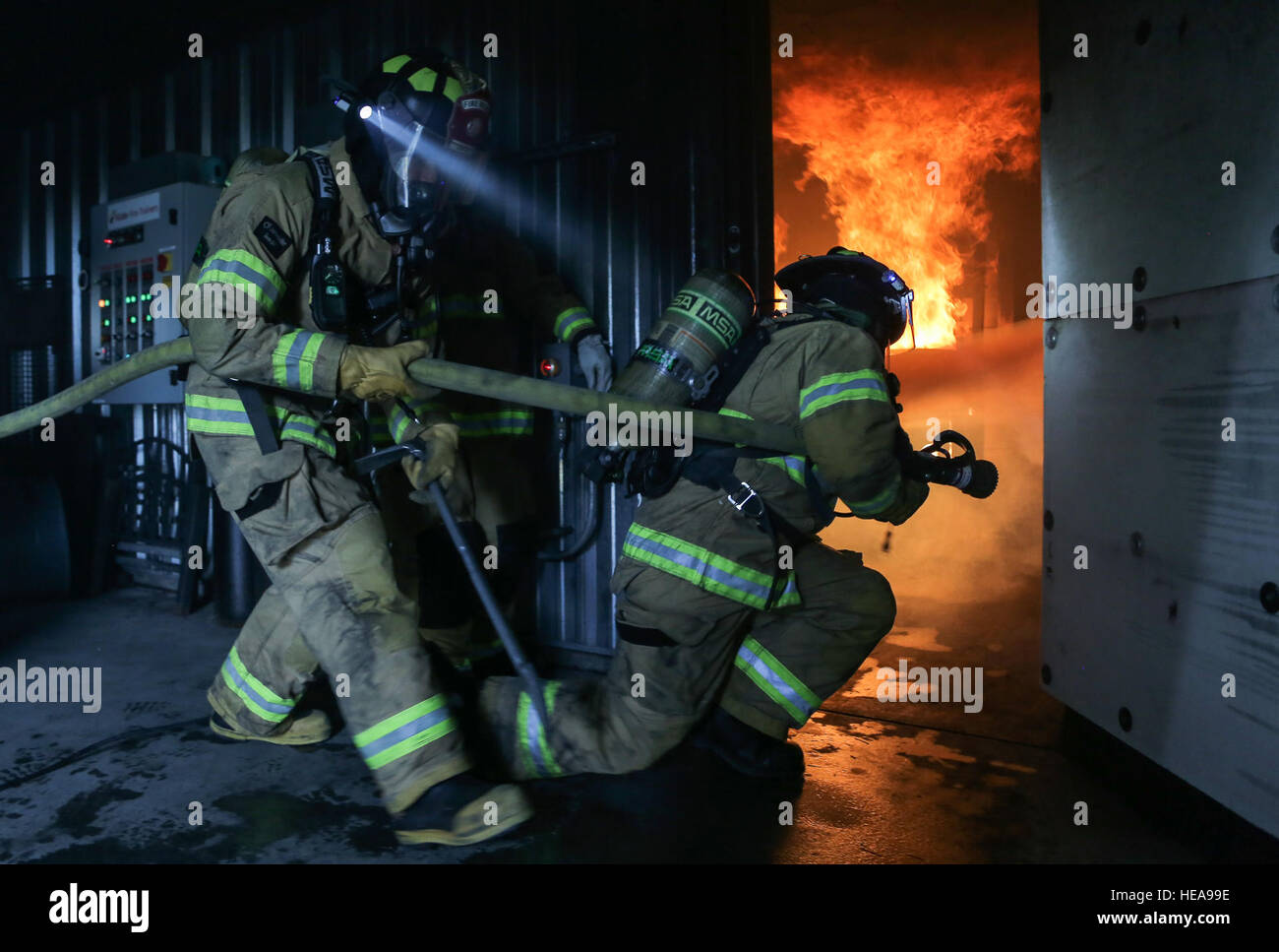 U.S. Air Force fire protection specialists assigned to the 673rd Civil ...