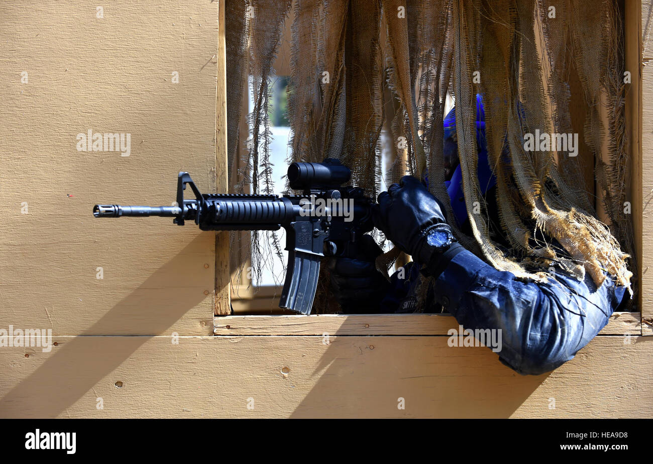 Officer Robert Smith, assigned to the 673rd Security Forces Squadron ...