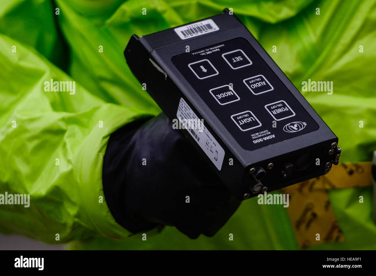 U.S. Air Force Airmen test for potential hazardous materials during an ...