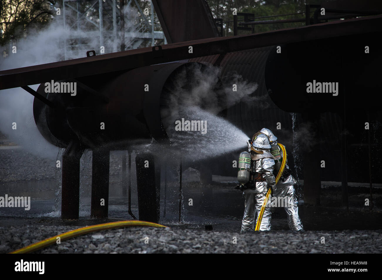 Firefighters from the 628th Civil Engineer Squadron practice fire ...
