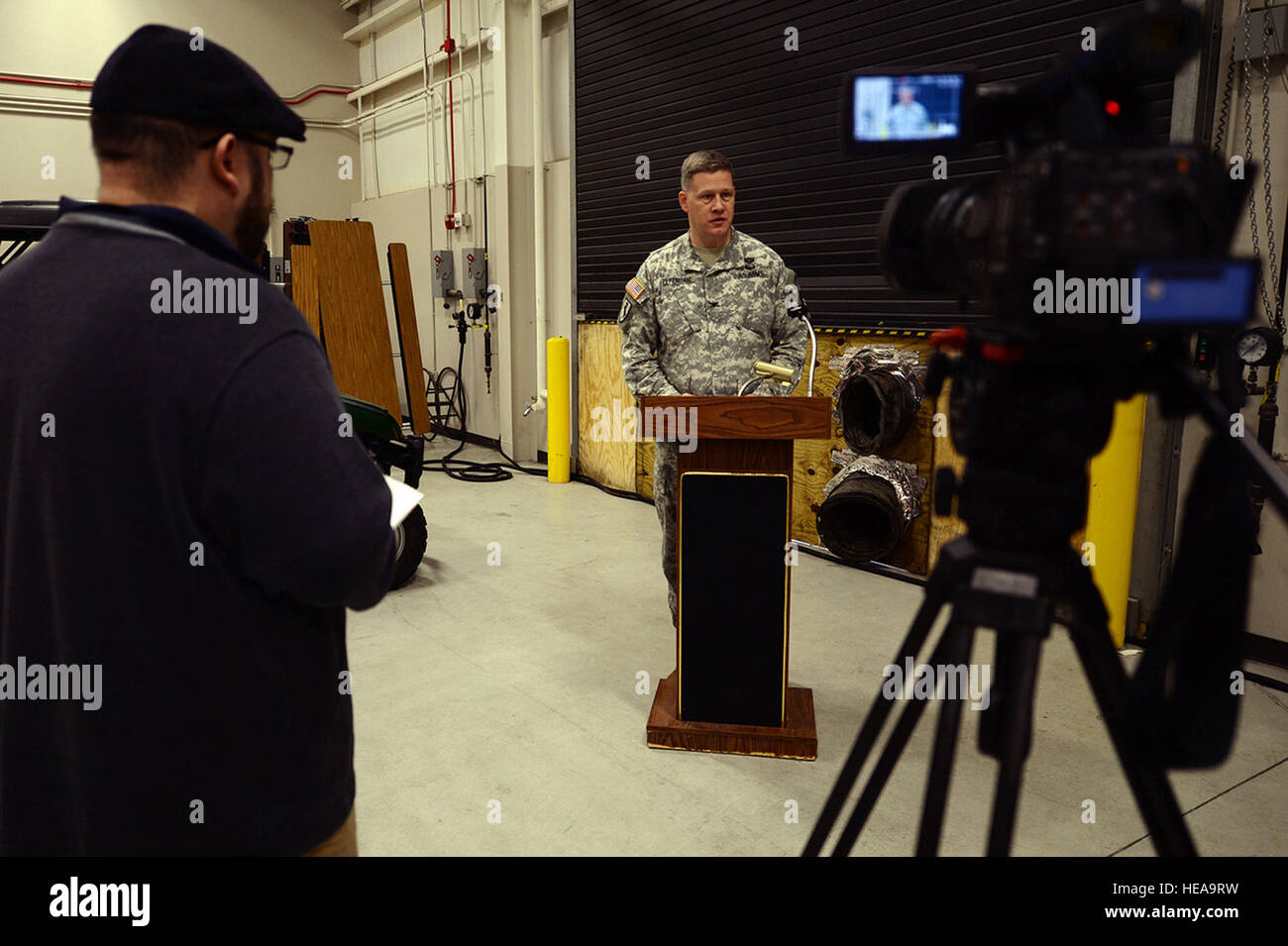 U.S. Army Col. Mark Elfendahl (center), a member of the Joint Enabling ...