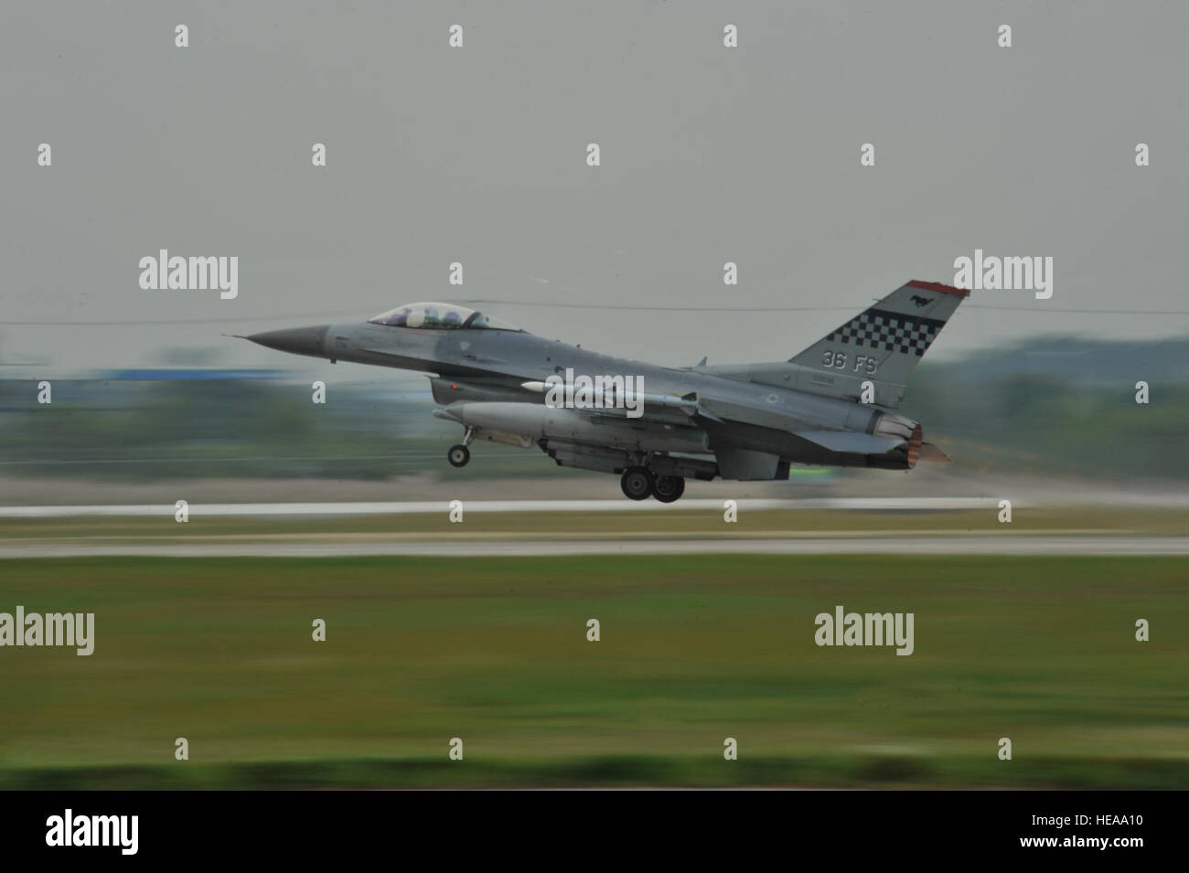 An F-16 Fighting Falcon from the 36th Fighter Squadron takes off from ...