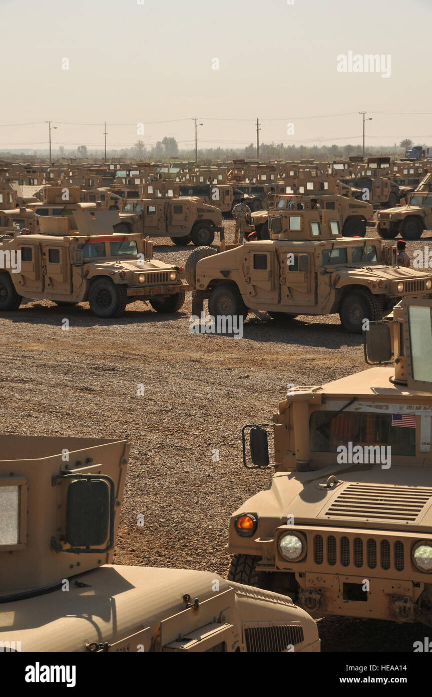 CAMP TAJI, Iraq - U.S. and Iraqi Army Soldiers drive M1114 HMMWVs to ...