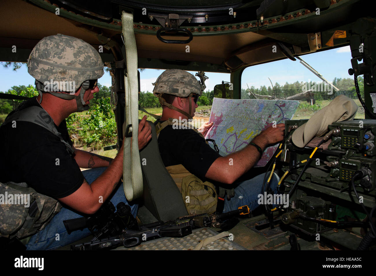 Army Sgt. Robert Devito, right, and Pfc. Jeffrey Harris, right, 1st ...
