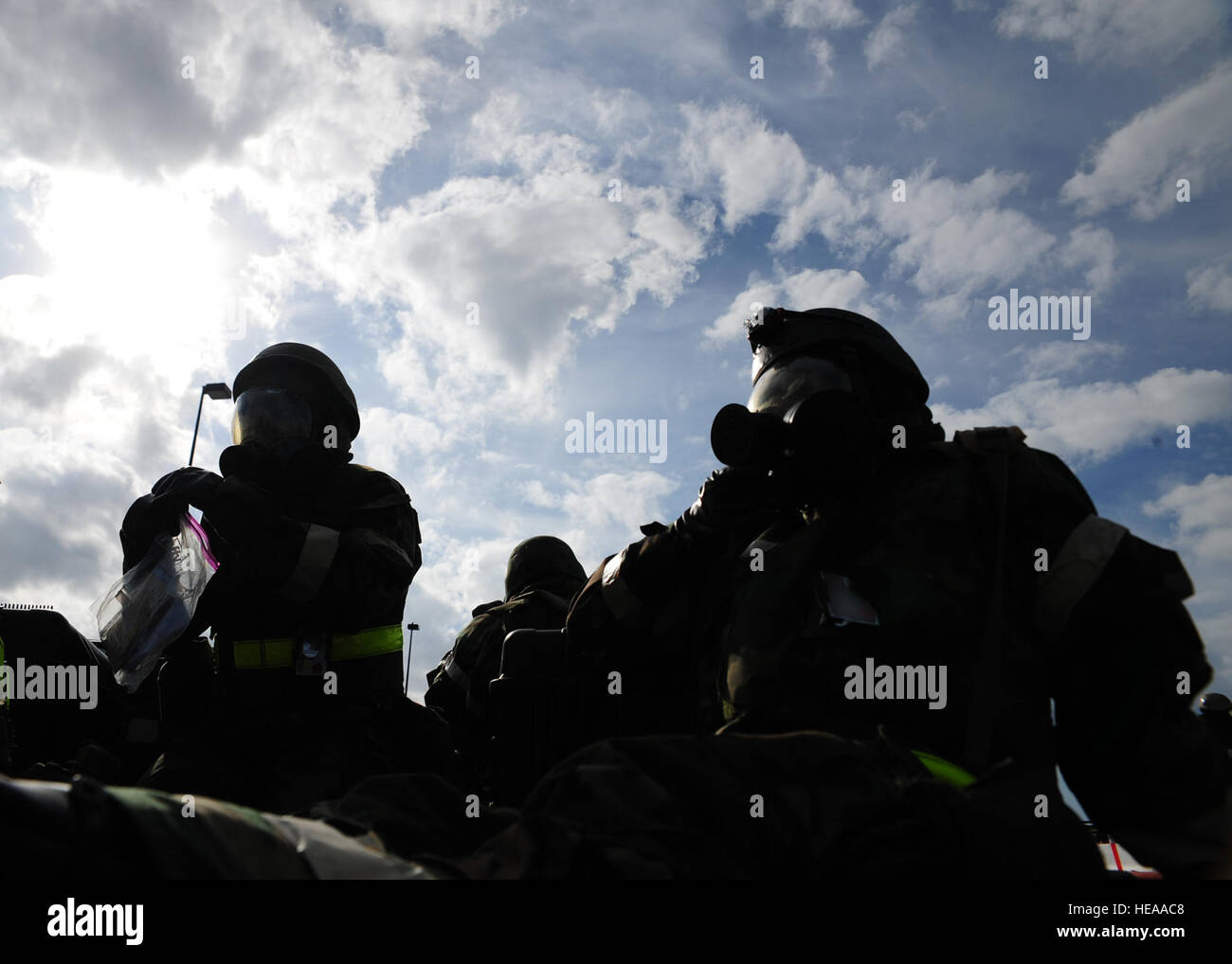 Airmen from the 437th Operations Group respond to an evacuation order ...