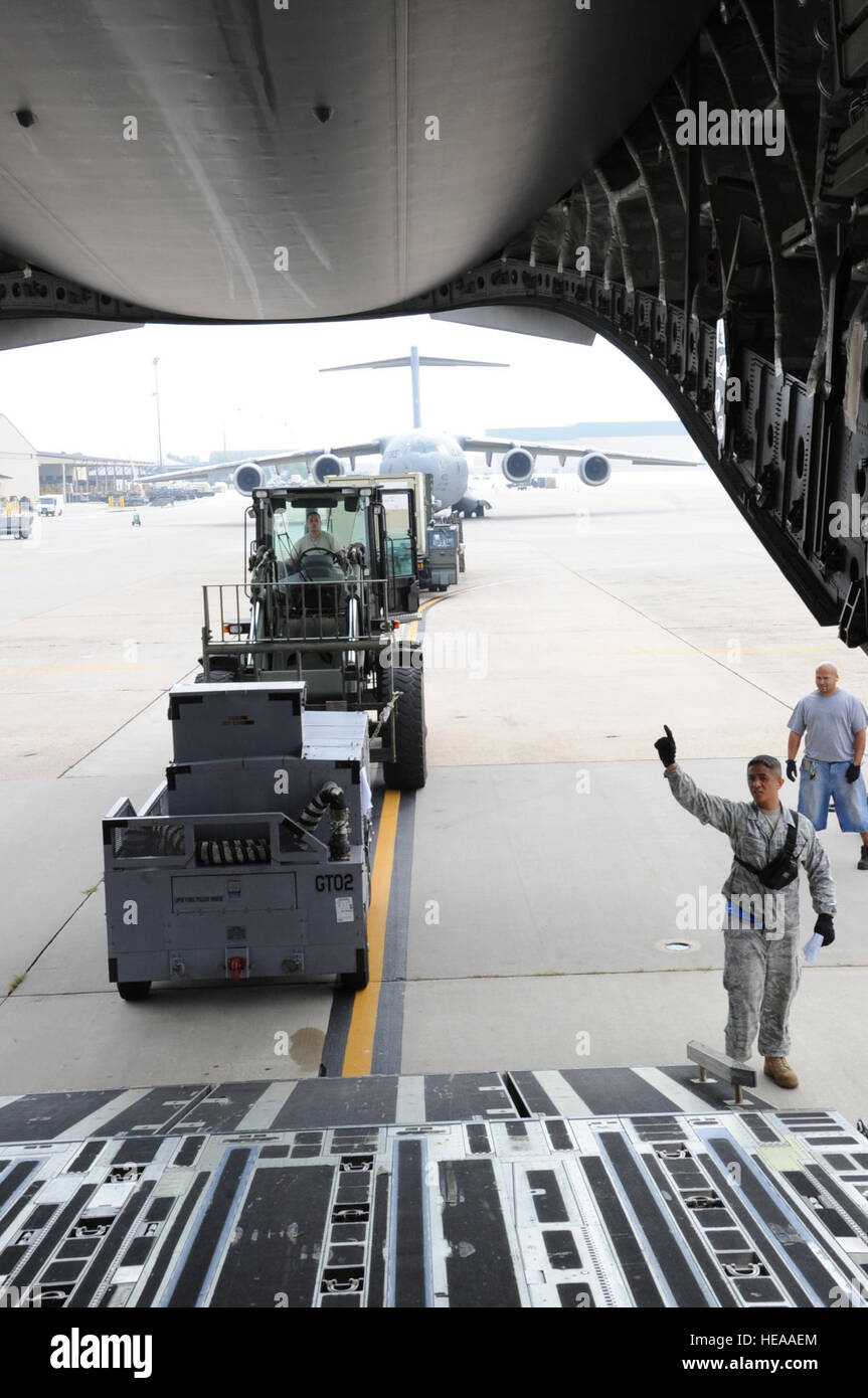 Joint Base McGuire-Dix-Lakehurst airmen load and secure equipment onto ...