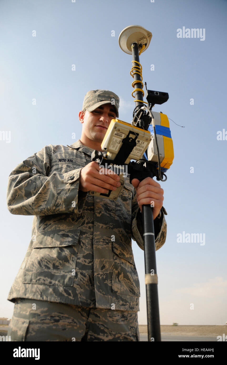 An Airman from the 380th Expeditionary Civil Engineer Squadron surveys ...