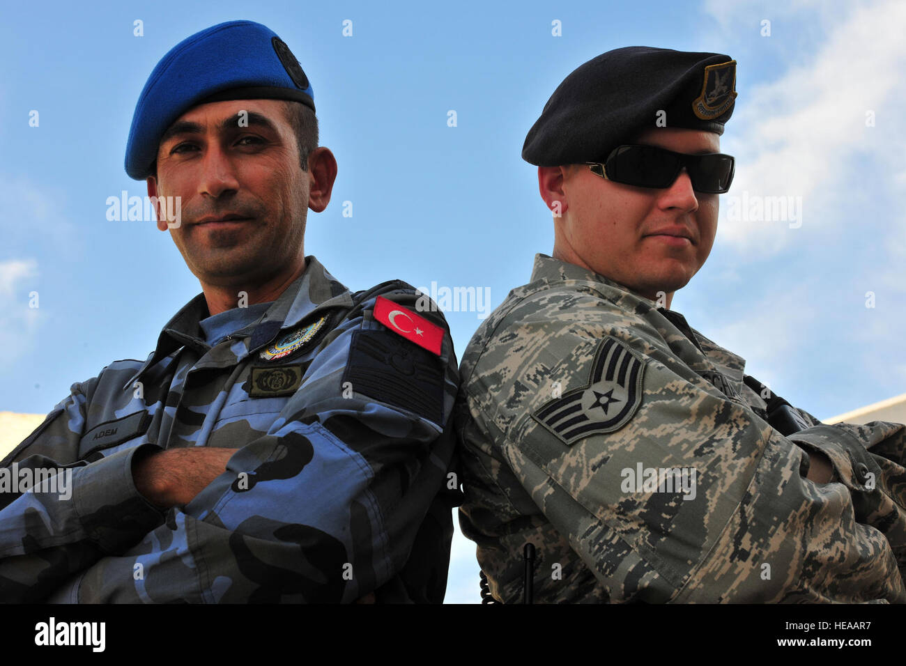Airman Adem (left), Turkish Air Force Security Forces patrolman, and ...