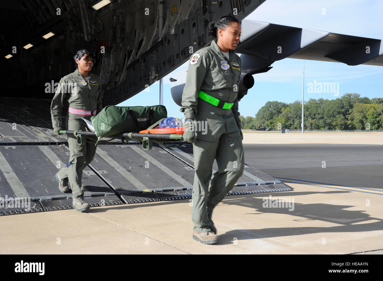 U.S. Air Force Staff Sergeants Mickisha Gordon, rear, and Laquita Mason ...