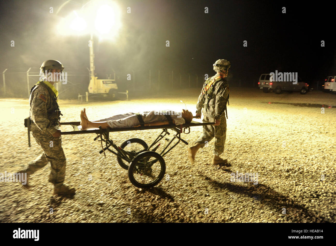 U.S. Army soldiers transport a medical dummy from the Combat Support ...