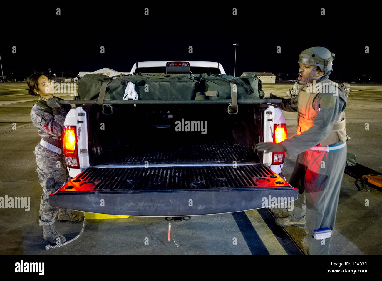 U.S. Air Force Staff Sgts. Lorena Quiral and Ross Rudolph, medical ...