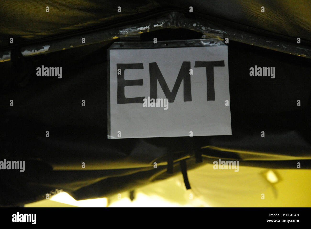 The emergency medical tent sign hangs above the entrance of the 328th ...