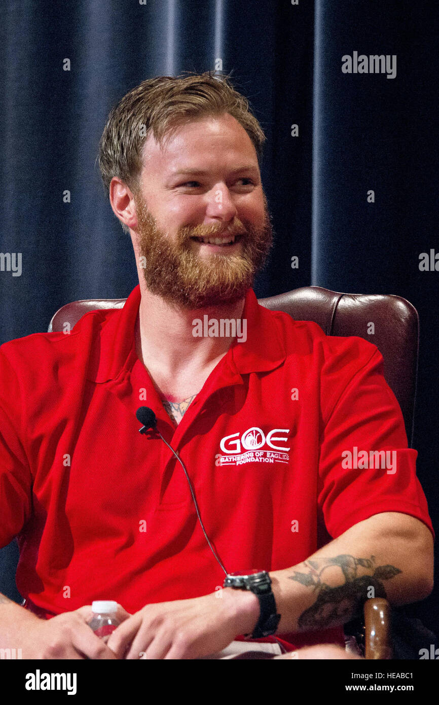 Technical Sergeant Zachary Rhyner, USAF, is interviewed during ...