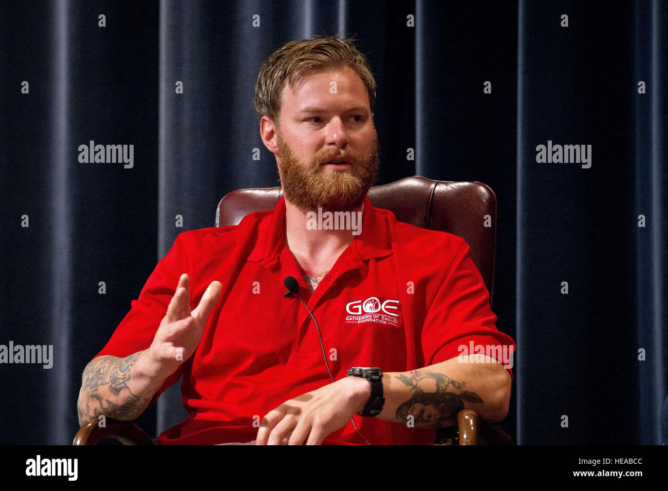Technical Sergeant Zachary Rhyner, USAF, is interviewed during ...