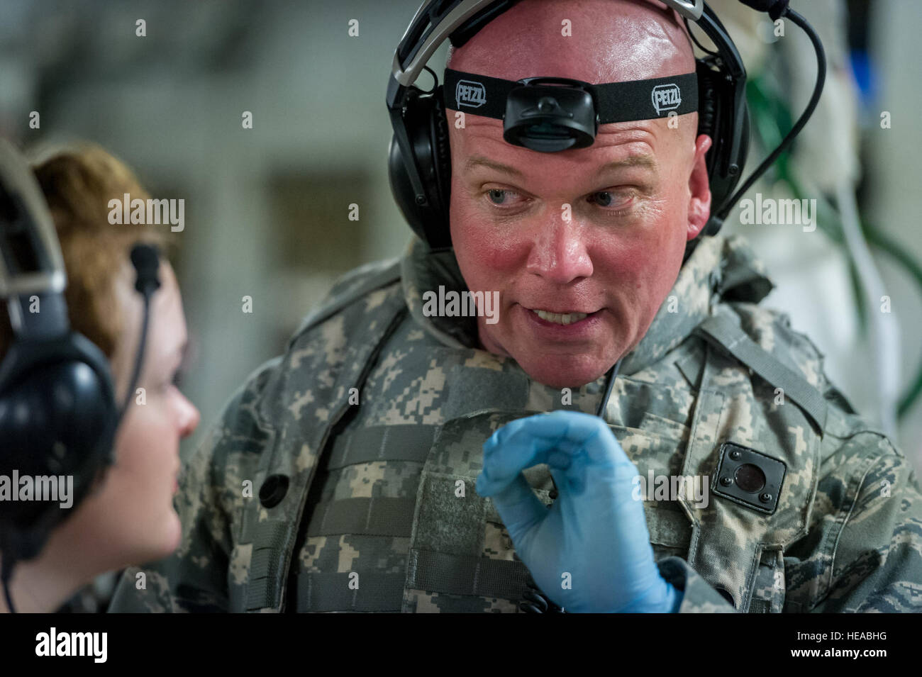 U.S. Air Force Lt. Col Richard Degrosa (right), emergency room doctor ...
