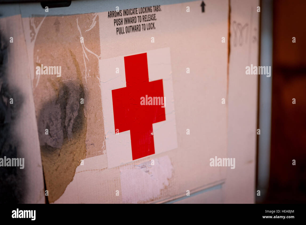 A red cross placard hangs on a pallet of medical equipment at Joint ...