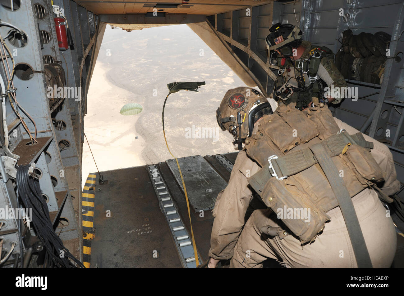 U.S. Marine Corps Cpl. Colton Patterson (left), a Marine Corps CH-53E ...