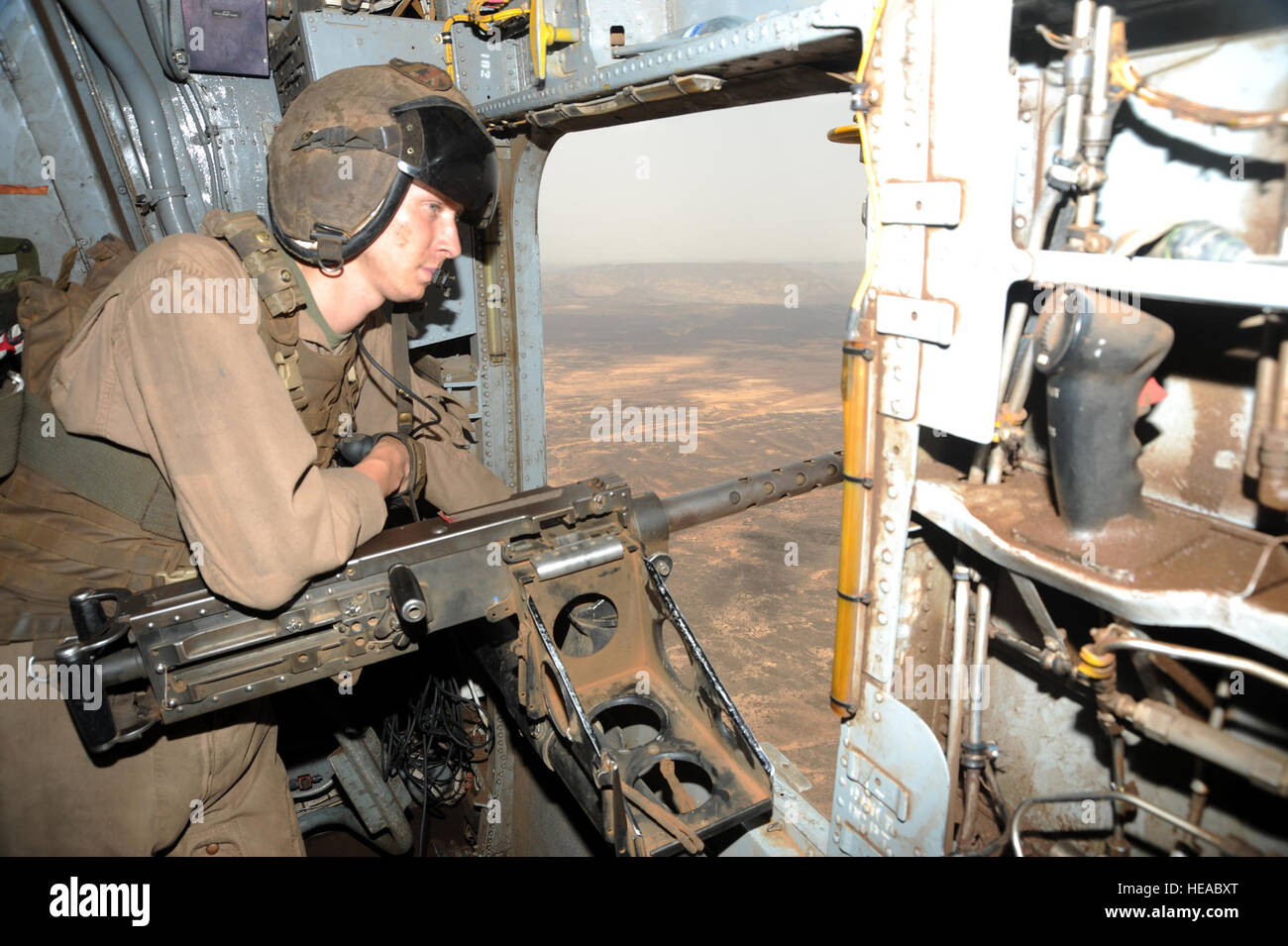 U.S. Marine Corps Cpl. Colton Patterson (left), a Marine Corps CH-53E ...