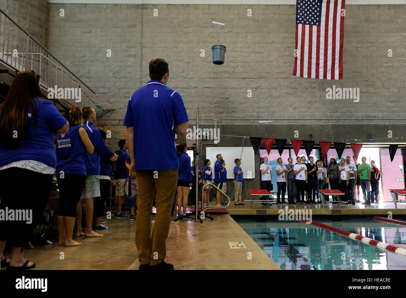 Air Force Trials swimming competitors, staff and volunteers, stand for ...