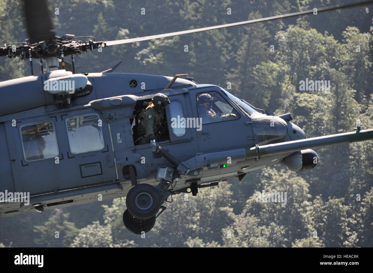 Airmen aboard an HH-60G Pave Hawk helicopter from the 943rd Rescue ...