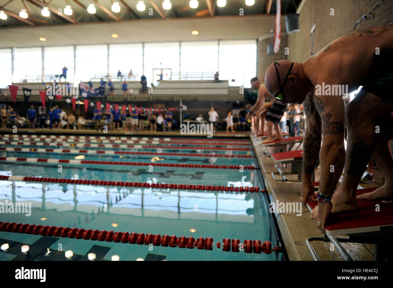 Air Force Trials swimming competitors await the start of a race during ...