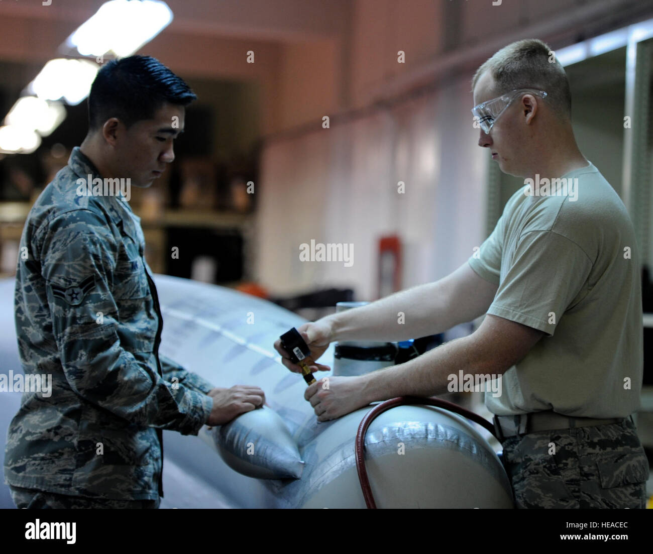 Air Force apprentices demonstrate the inflation and use of an E-3 ...