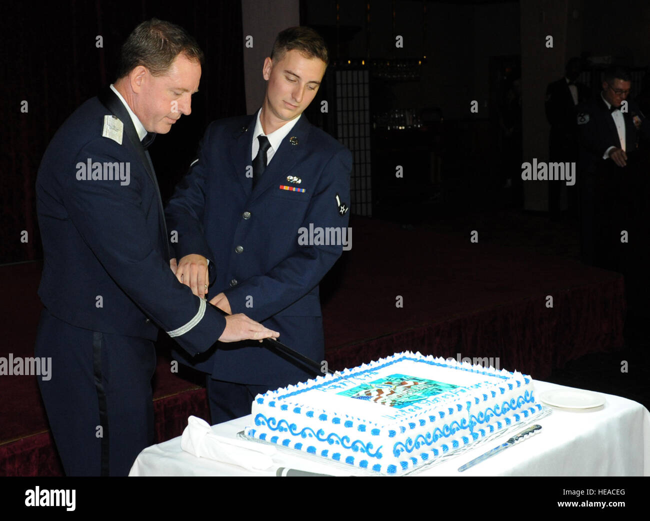 U.S. Air Force Brig. Gen. James Hecker, 18th Wing commander, and Airman ...