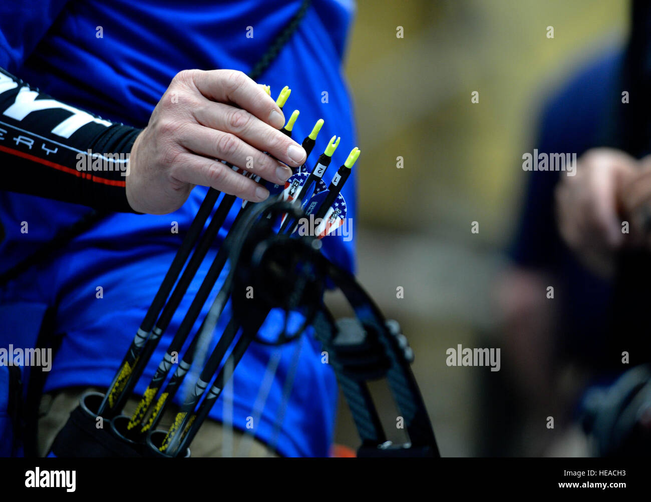 A U.S. Air Force wounded warrior pulls an arrow from his quill at the ...