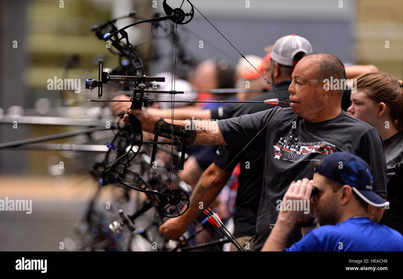 U.S. Air Force Master Sgt. Israel Del Toro Jr. uses his bite trigger to ...
