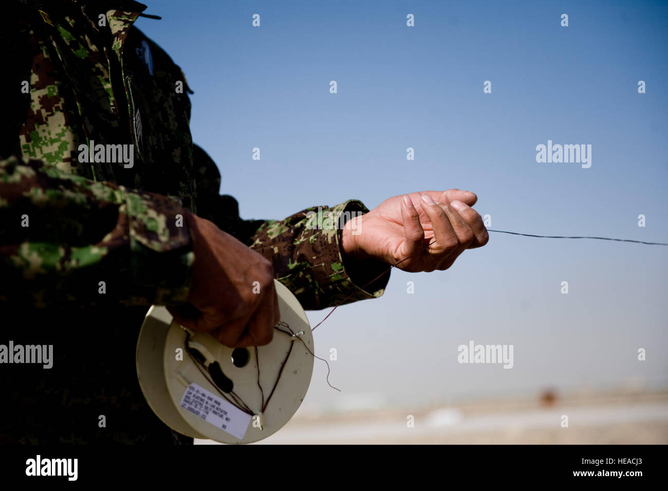 Afghan National Army soldiers practice counter-IED operations while ...