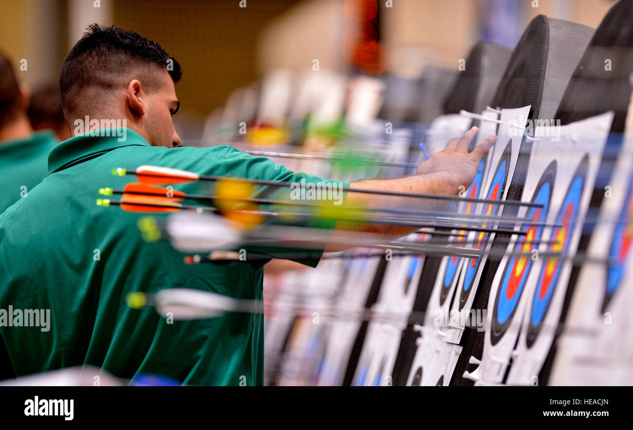 A referee judges targets during the the archery competition at the 2016 ...