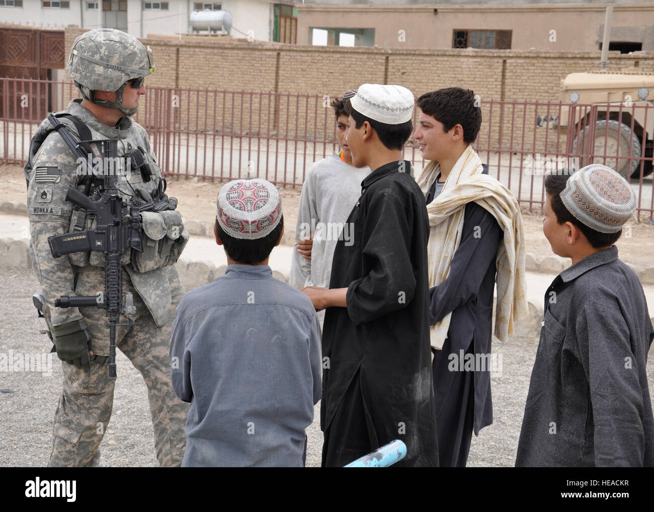 The Kandahar Provincial Reconstruction Team works on a green space ...